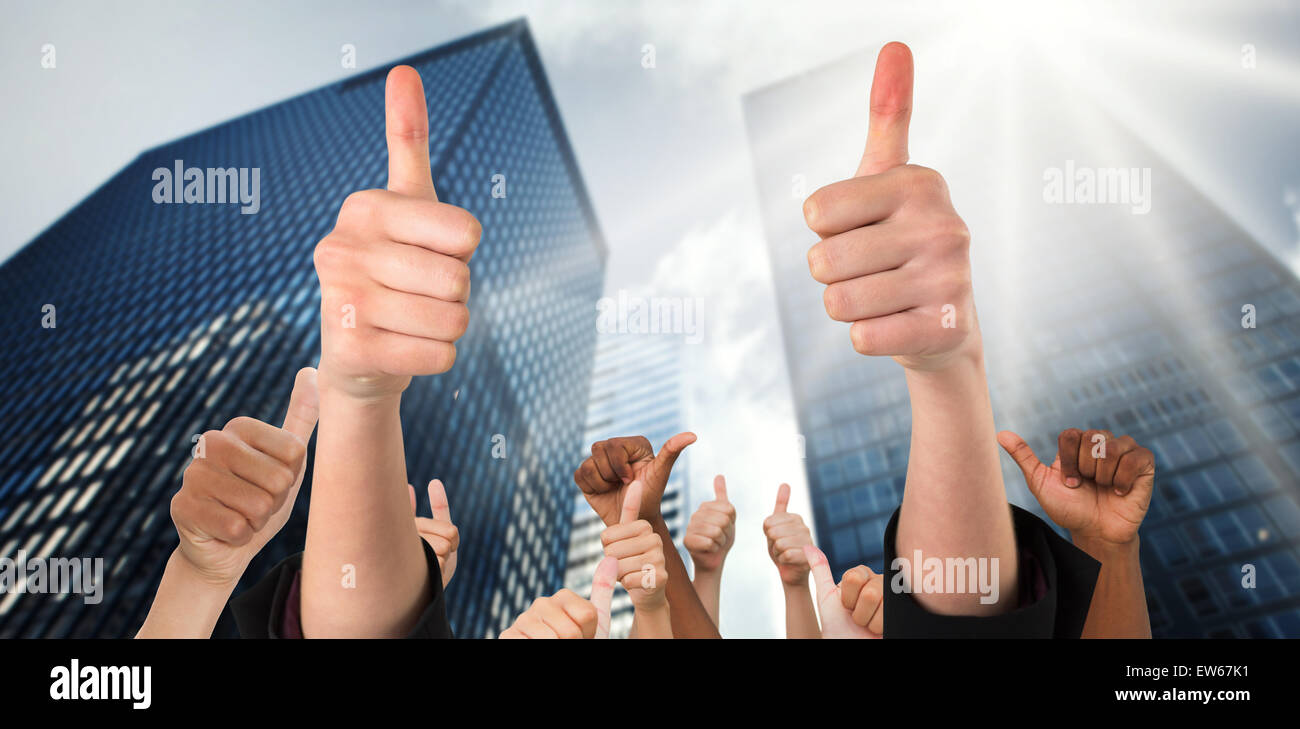 Composite image of hands showing thumbs up Stock Photo - Alamy