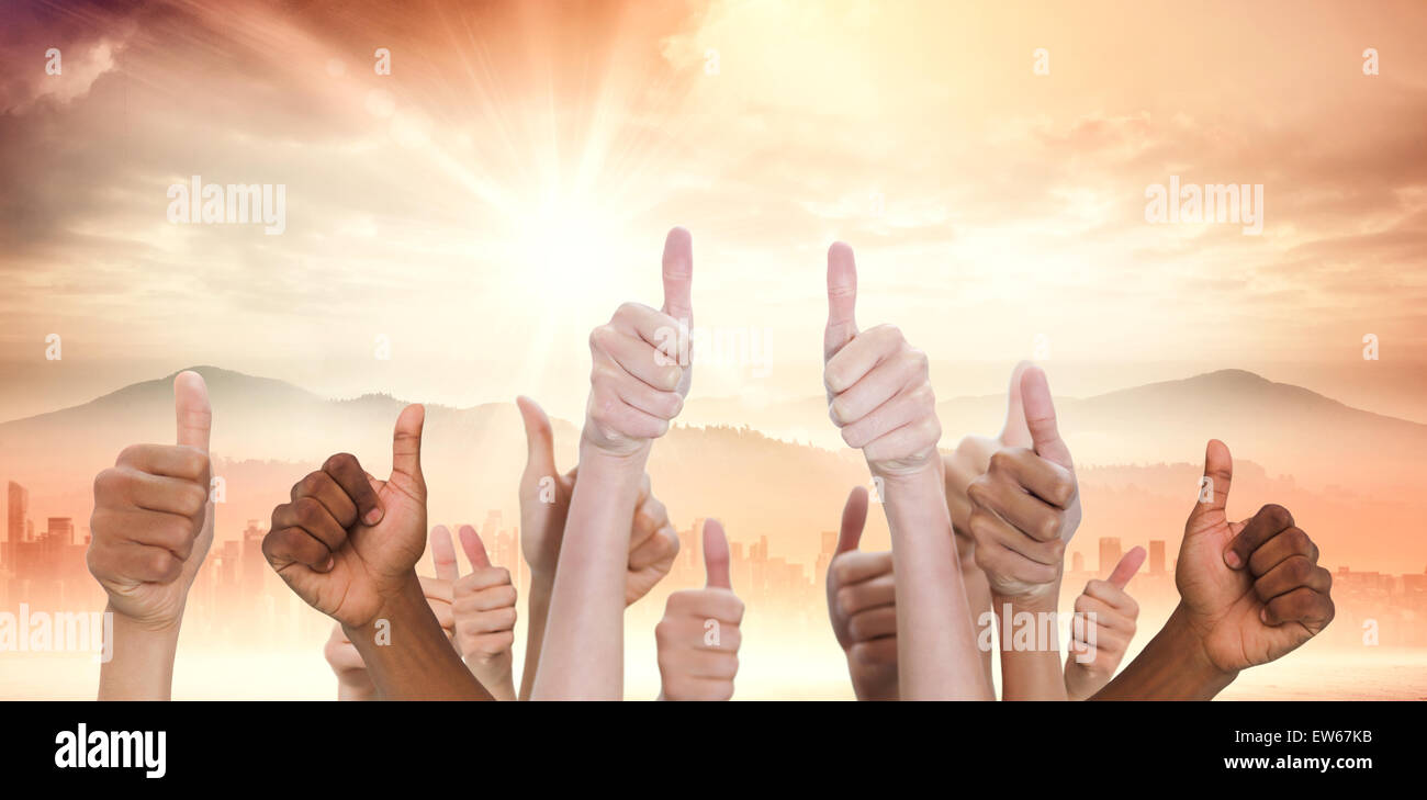 Composite image of hands showing thumbs up Stock Photo - Alamy