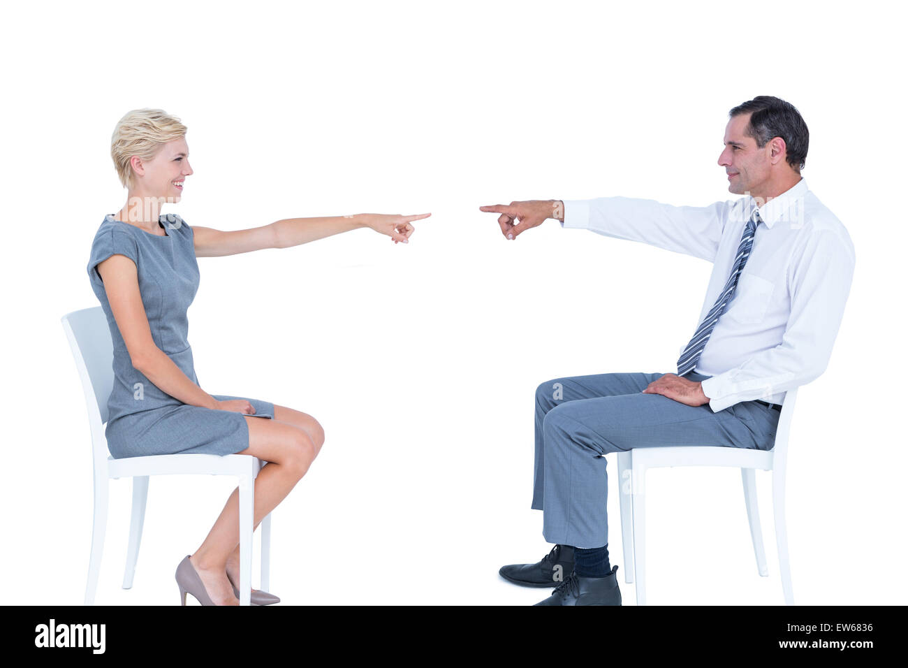 business people pointing at each other Stock Photo - Alamy