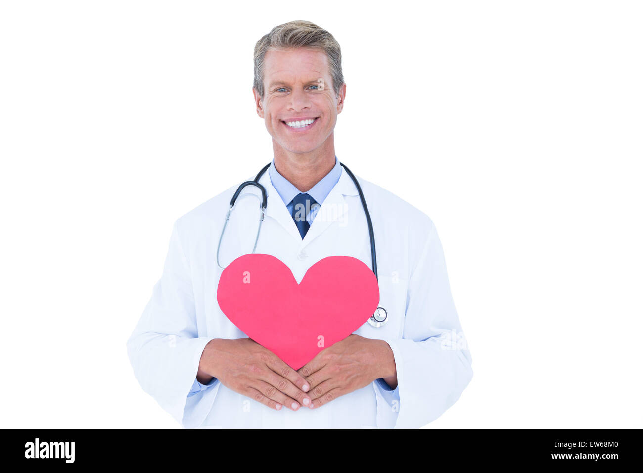 Smiling doctor holding heart card Stock Photo - Alamy Smiling doctor holding heart card Stock Photo - Alamy