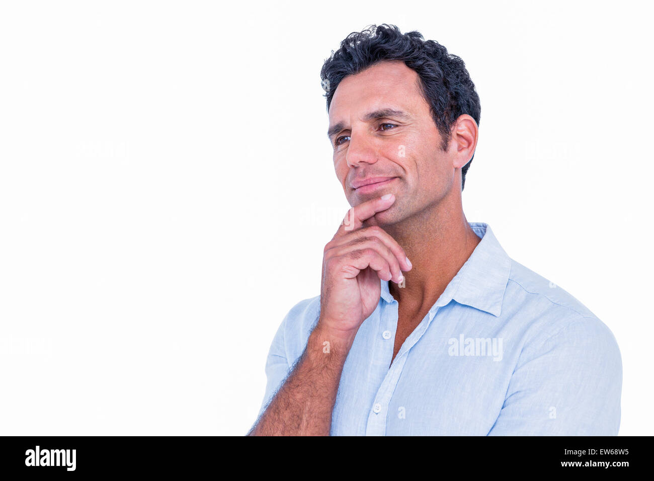 Handsome man thinking with finger on chin Stock Photo - Alamy