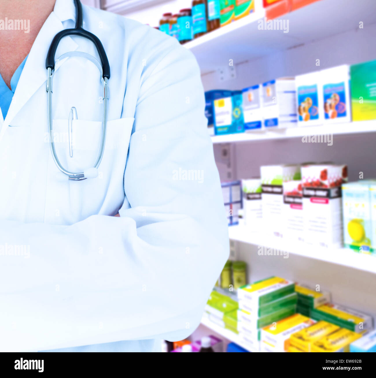 Composite image of doctor standing arms crossed Stock Photo - Alamy