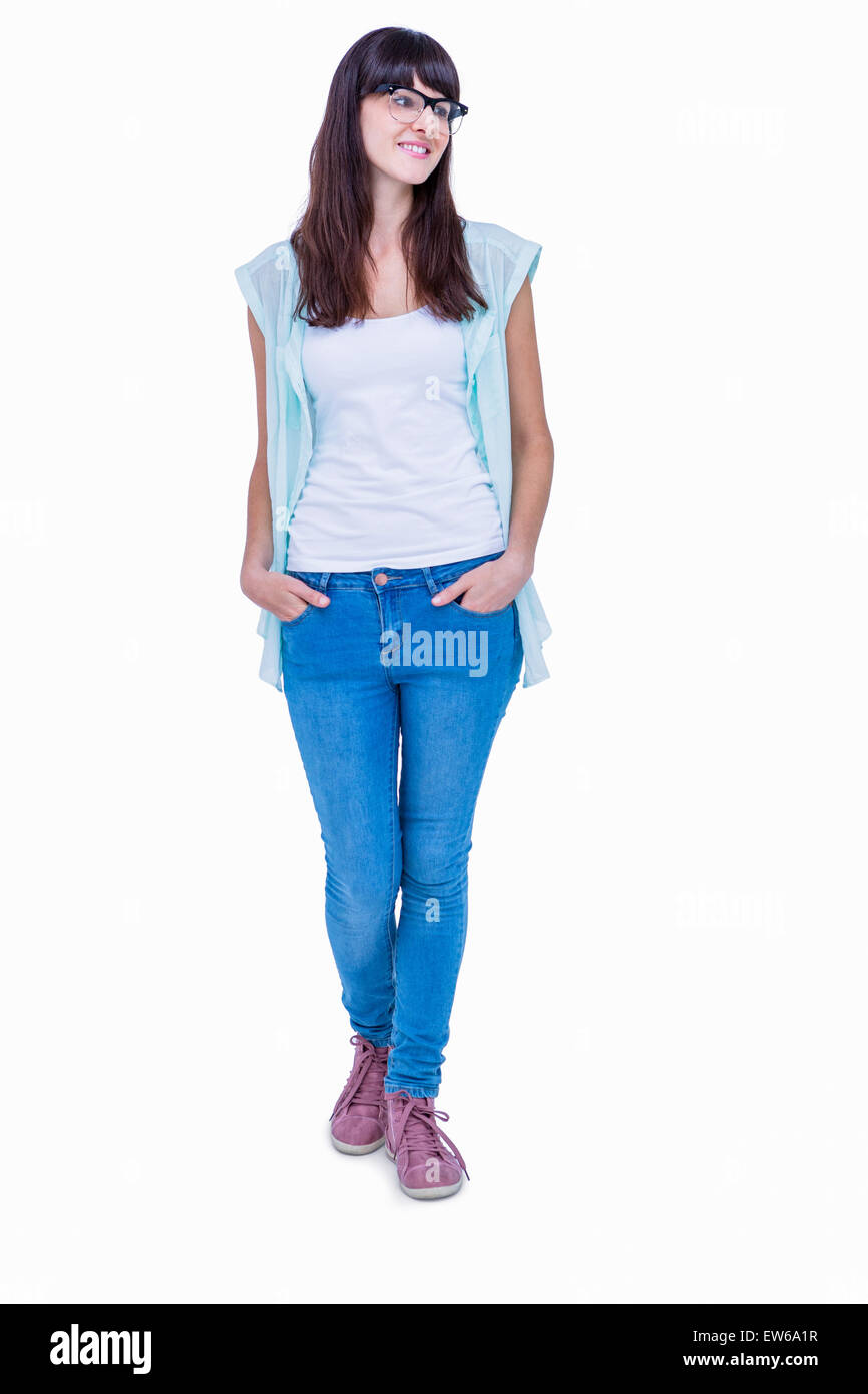 Pretty geeky hipster with hands in pocket looking away Stock Photo - Alamy