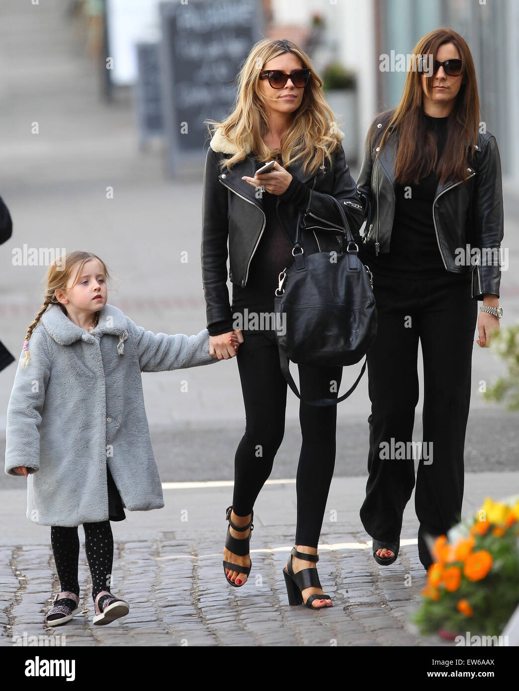 Pregnant Abbey Clancy and her daughter Sophia out with a friend in ...