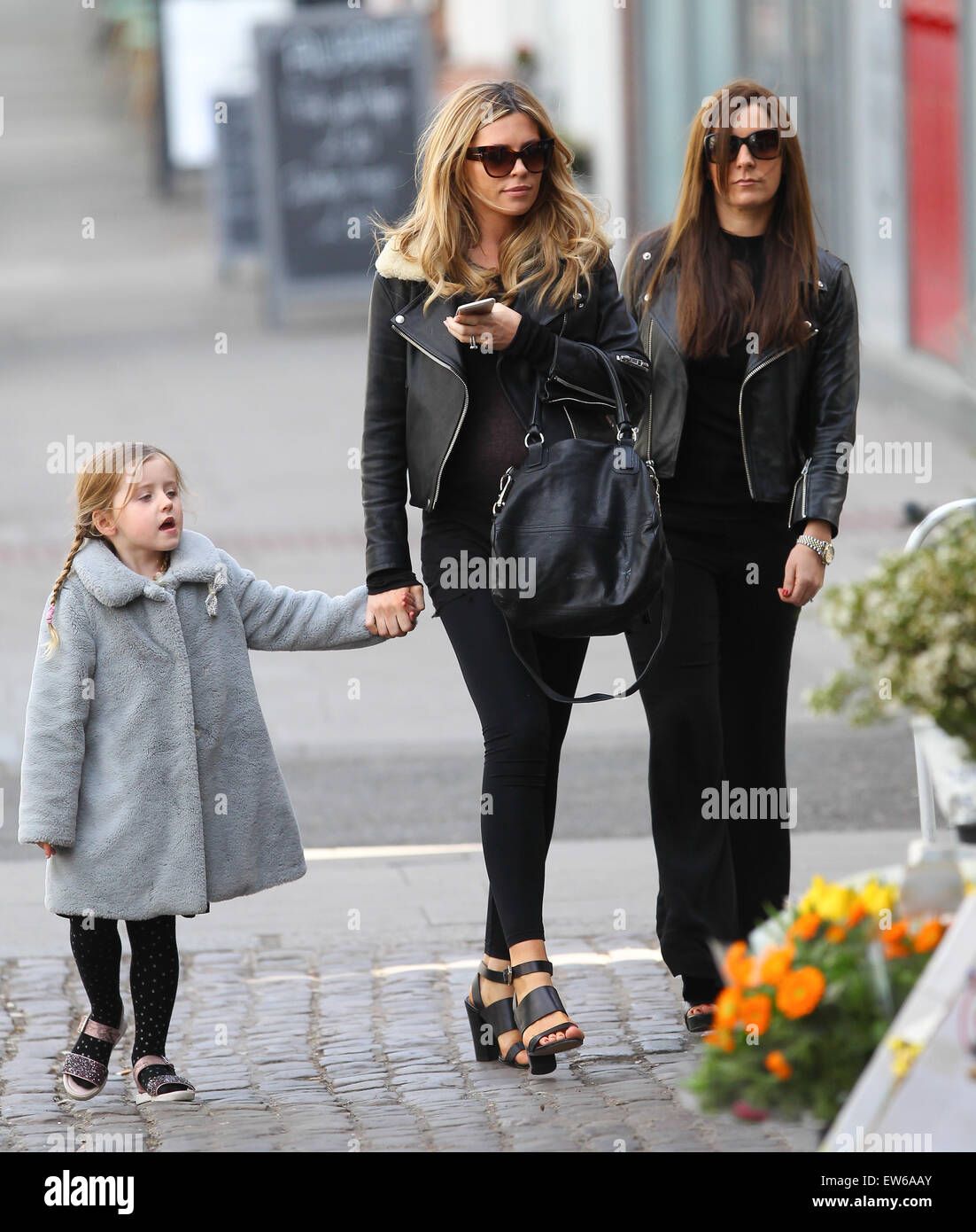 Pregnant Abbey Clancy and her daughter Sophia out with a friend in ...
