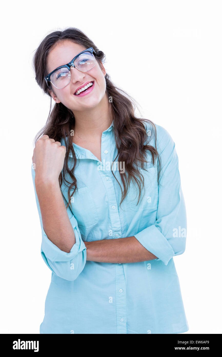 Pretty geeky hipster with a hand in her hair looking away Stock Photo - Alamy