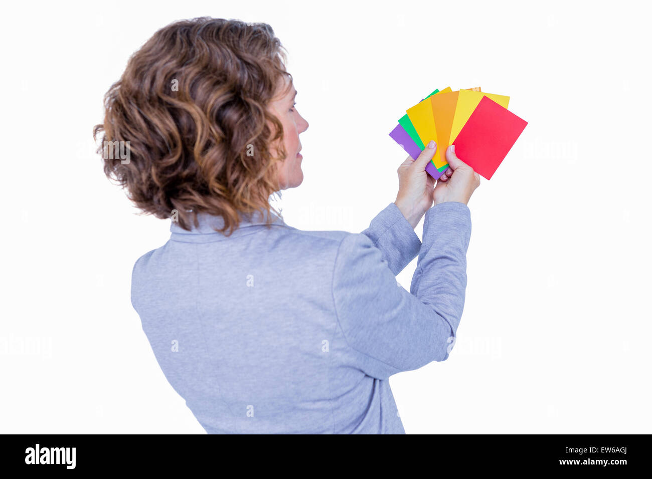 Businesswoman looking at colors cards Stock Photo - Alamy