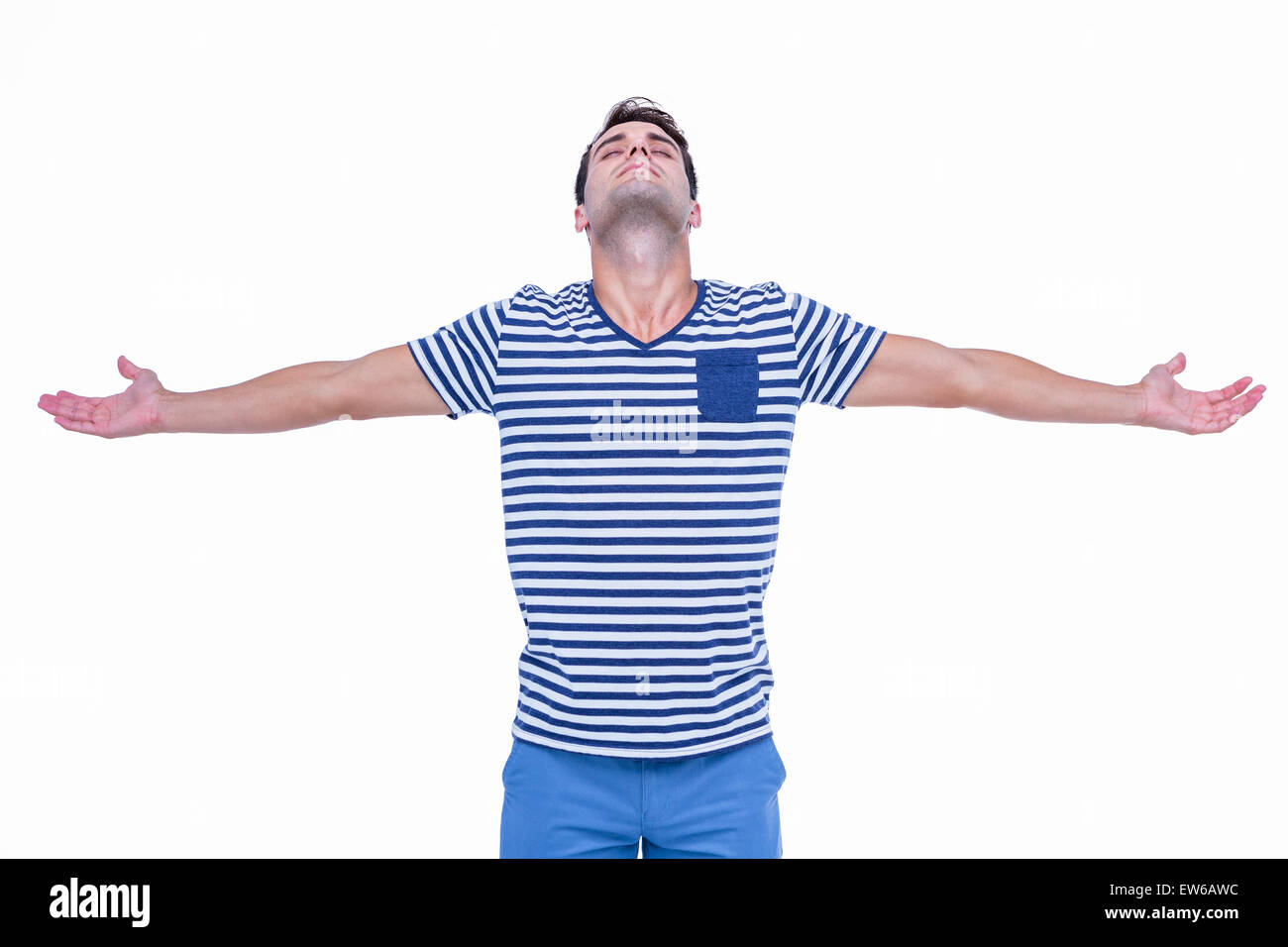 Handsome hipster with arms outstretched Stock Photo - Alamy