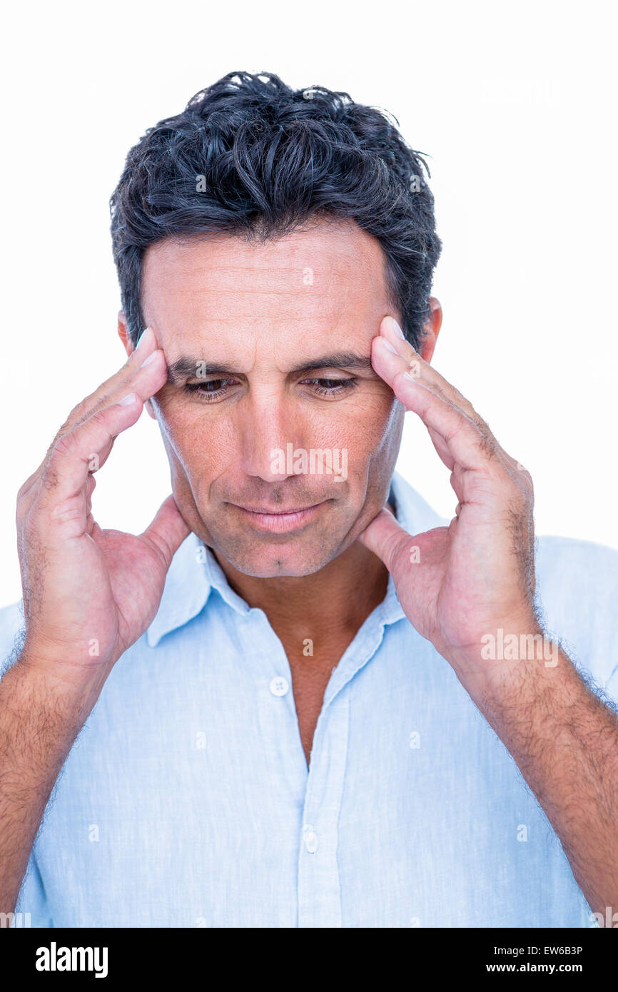 Handsome man thinking with hand on forehead Stock Photo - Alamy