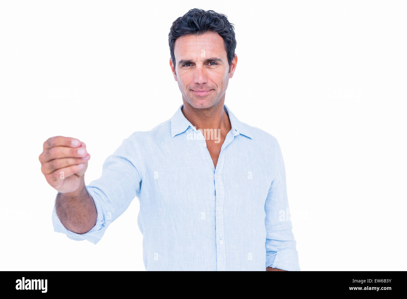 Happy handsome man looking at camera Stock Photo - Alamy