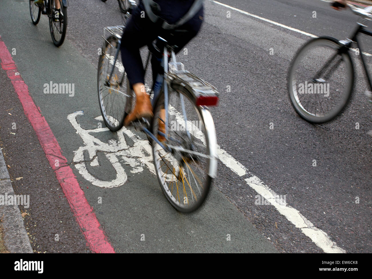 Cyclists commuting to work in London morning rush hour Stock Photo - Alamy
