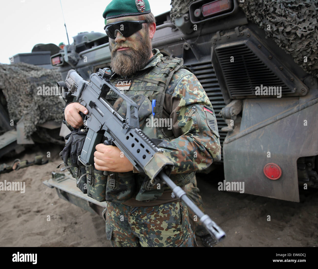 Sagan, Poland. 18th June, 2015. A German soldier holds a G36 assault ...