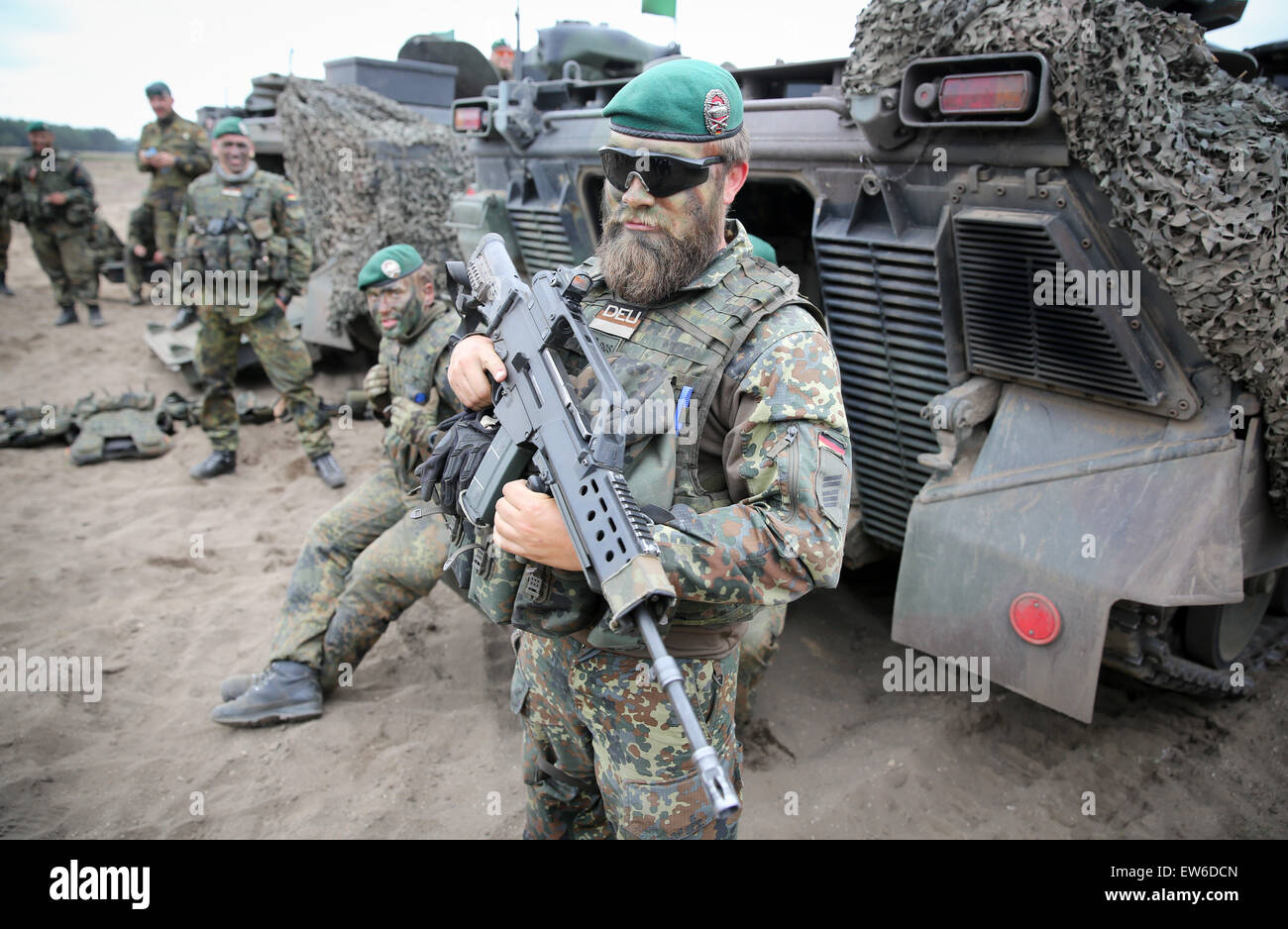 Sagan, Poland. 18th June, 2015. A German soldier holds a G36 assault ...