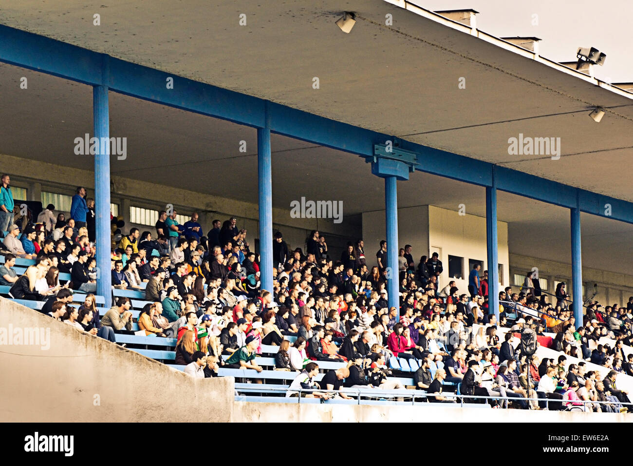 crowd sitting in the grandstand of a sport match Stock Photo - Alamy