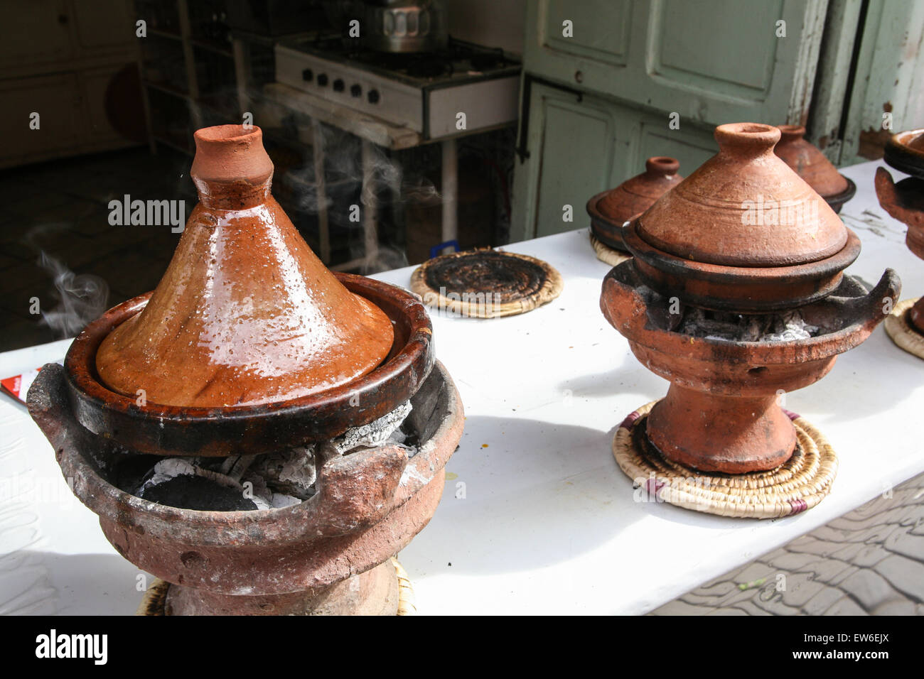 traditional,food,in,Cooking of tajine pot, a clay pot often containing ...