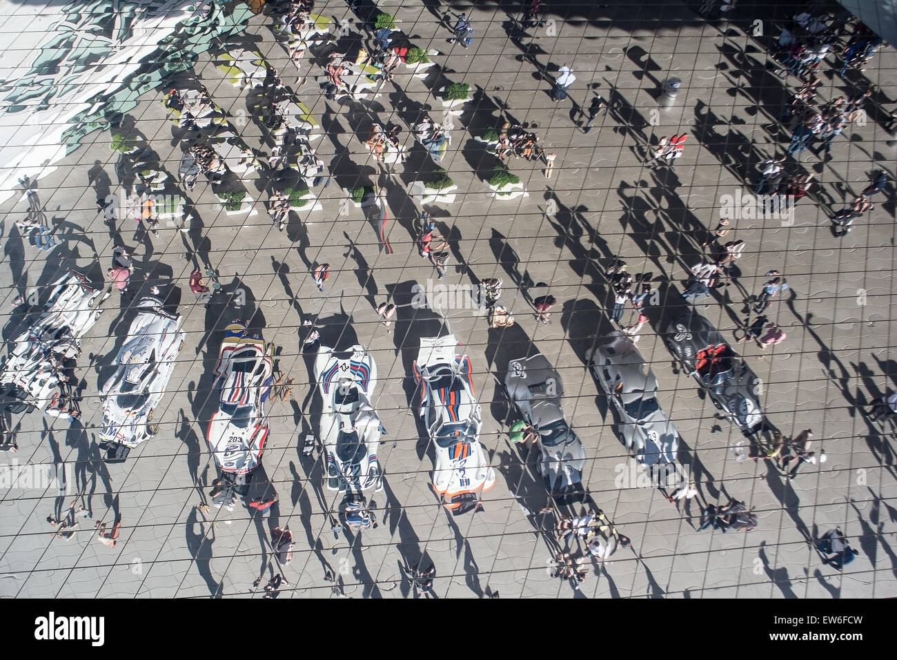 Classic Porsche endurance race cars reflected at the mirrored ceiling ...