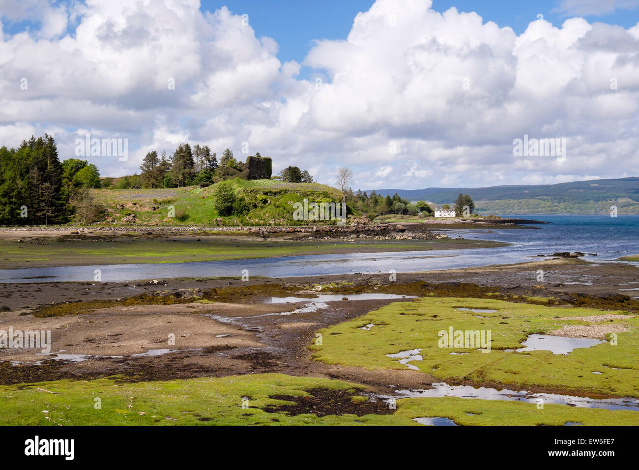 View across river estuary to Aros Castle in Sound of Mull. Isle of Mull ...