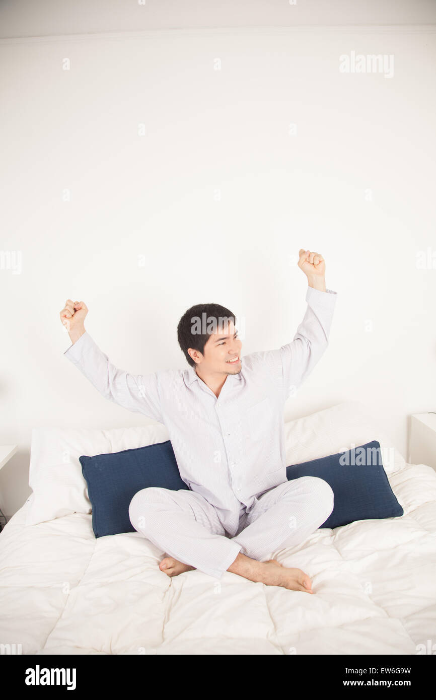 Young man in his bedroom Stock Photo - Alamy