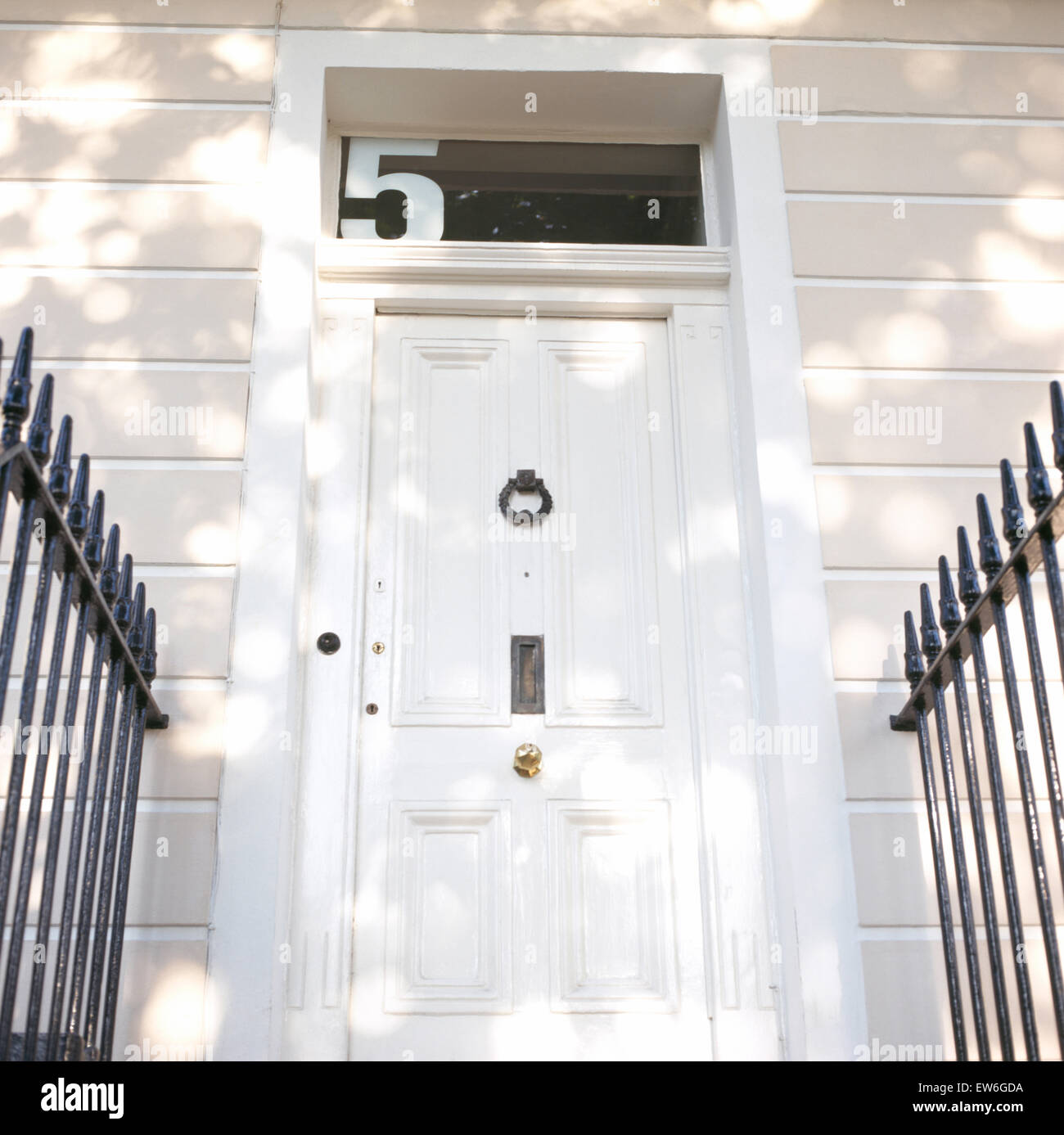 Exterior of a white painted front door Stock Photo - Alamy