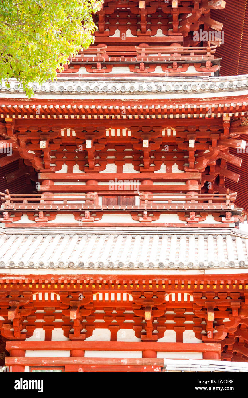 Close up of the vermilion three story pagoda at the Saikokuji temple at ...