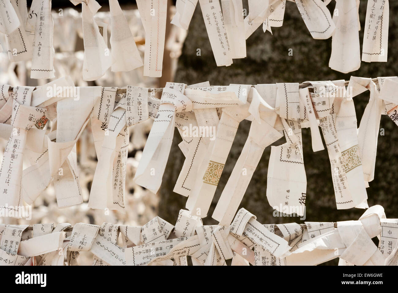Japan, Kurashiki, Achi-jinja Shrine. Wooden frame with rows of omikuji ...