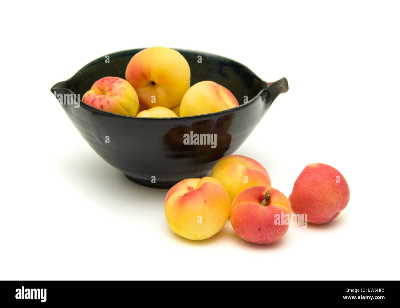 small ripe apricots isolated on white background Stock Photo - Alamy
