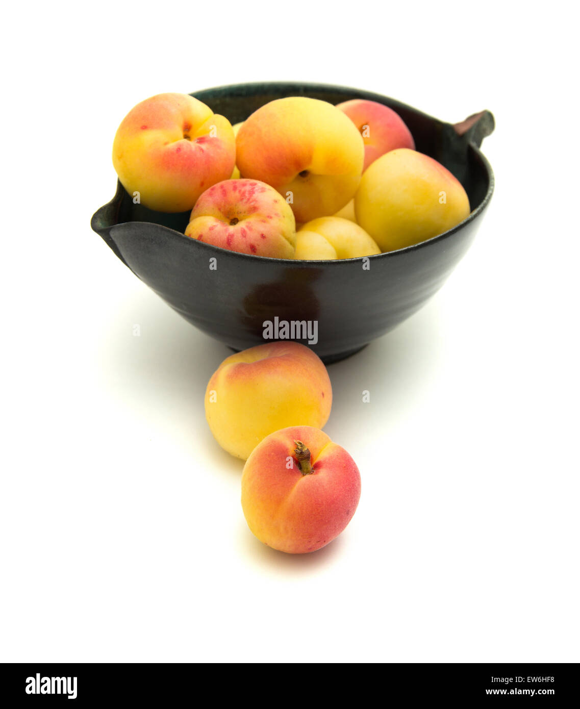 small ripe apricots isolated on white background Stock Photo - Alamy