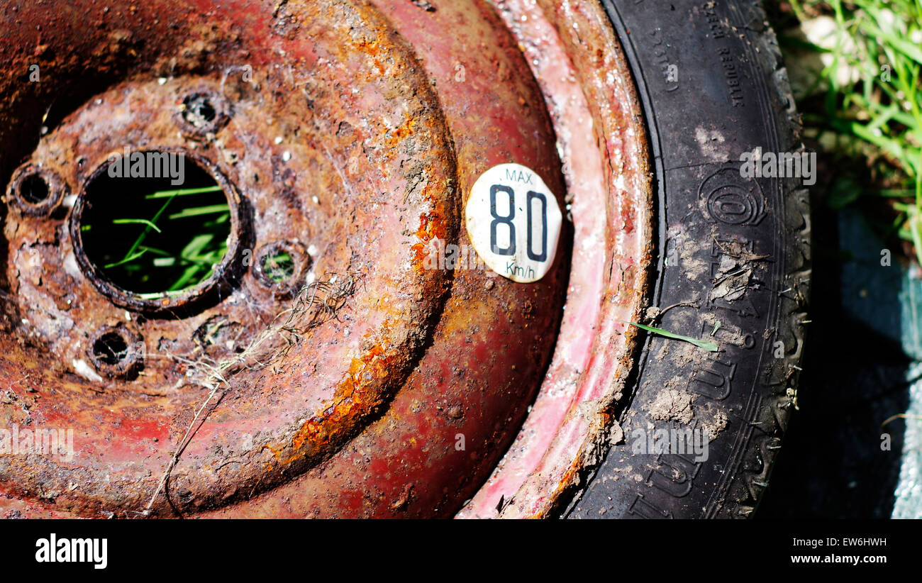 Rusty Spare Emergency Wheel Rim Stock Photo - Alamy