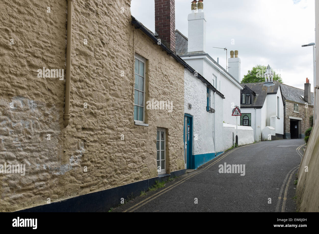 Old houses with thick stone painted walls in the Devon town of Totnes ...