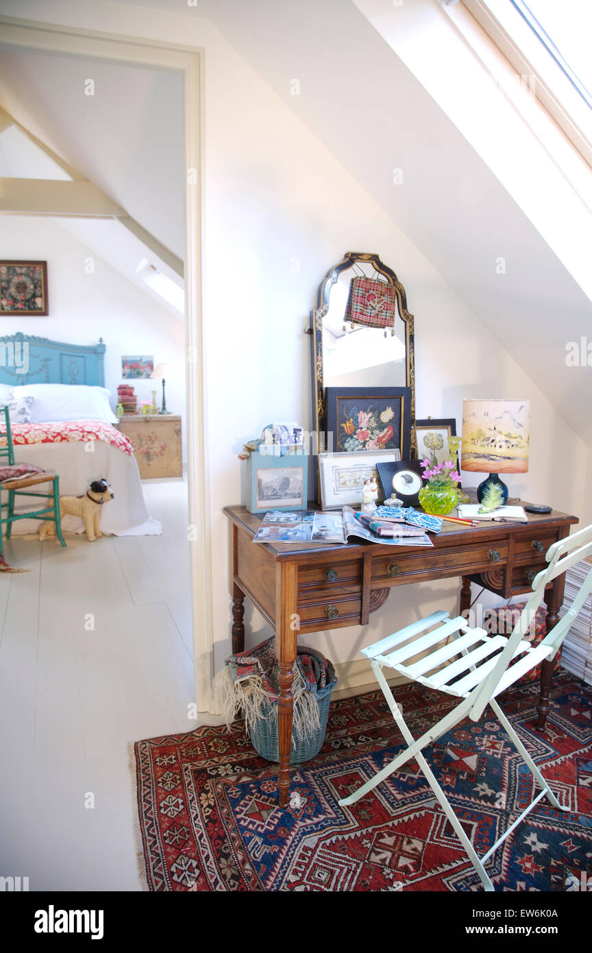 Folding chair beside hi-res stock photography and images - Alamy