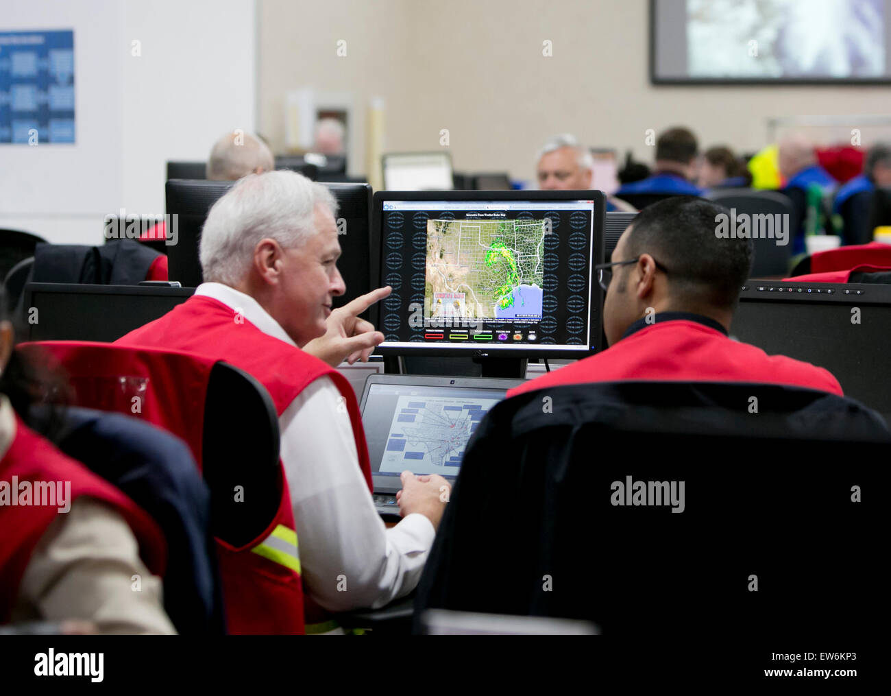 workers inside the Texas Division of Emergency Management, State ...