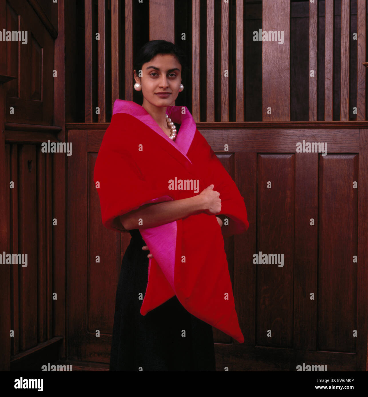 Portrait of a woman modelling a hand made red velvet stole Stock Photo ...