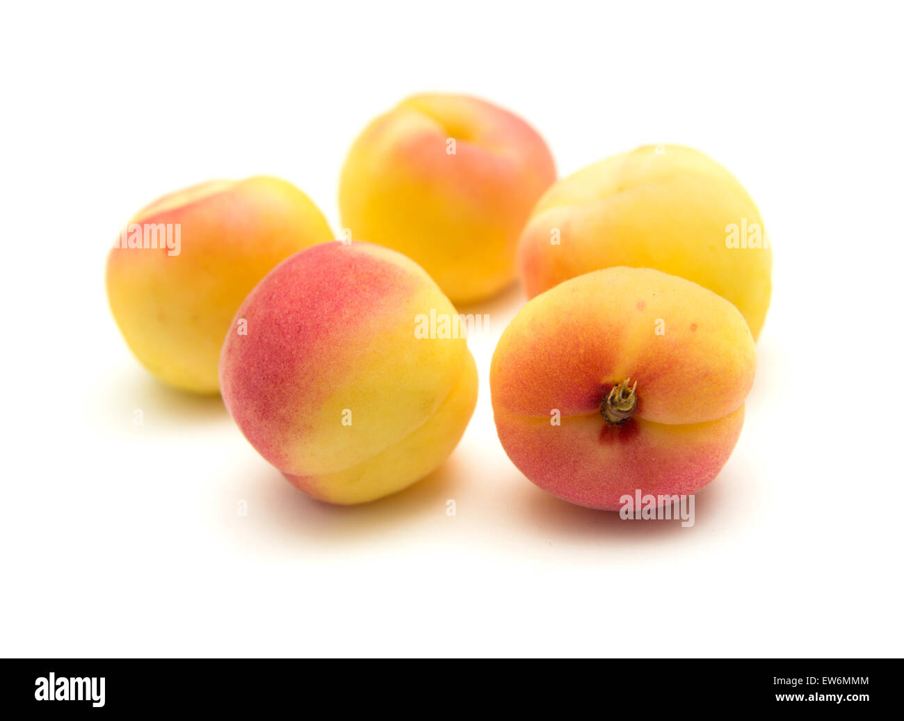 small ripe apricots isolated on white background Stock Photo - Alamy