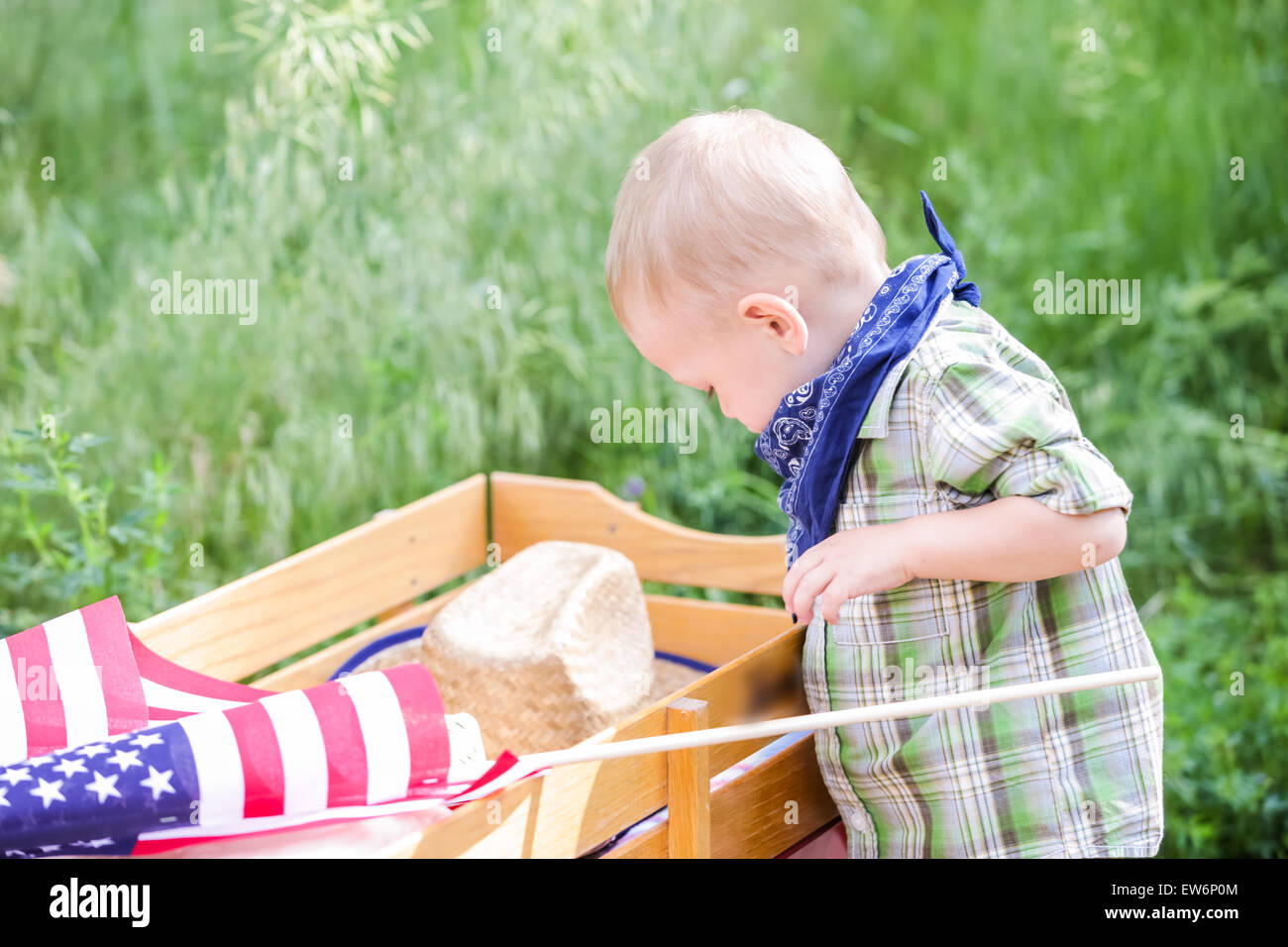 Toddlers having fun in the park for July Fourth Stock Photo - Alamy