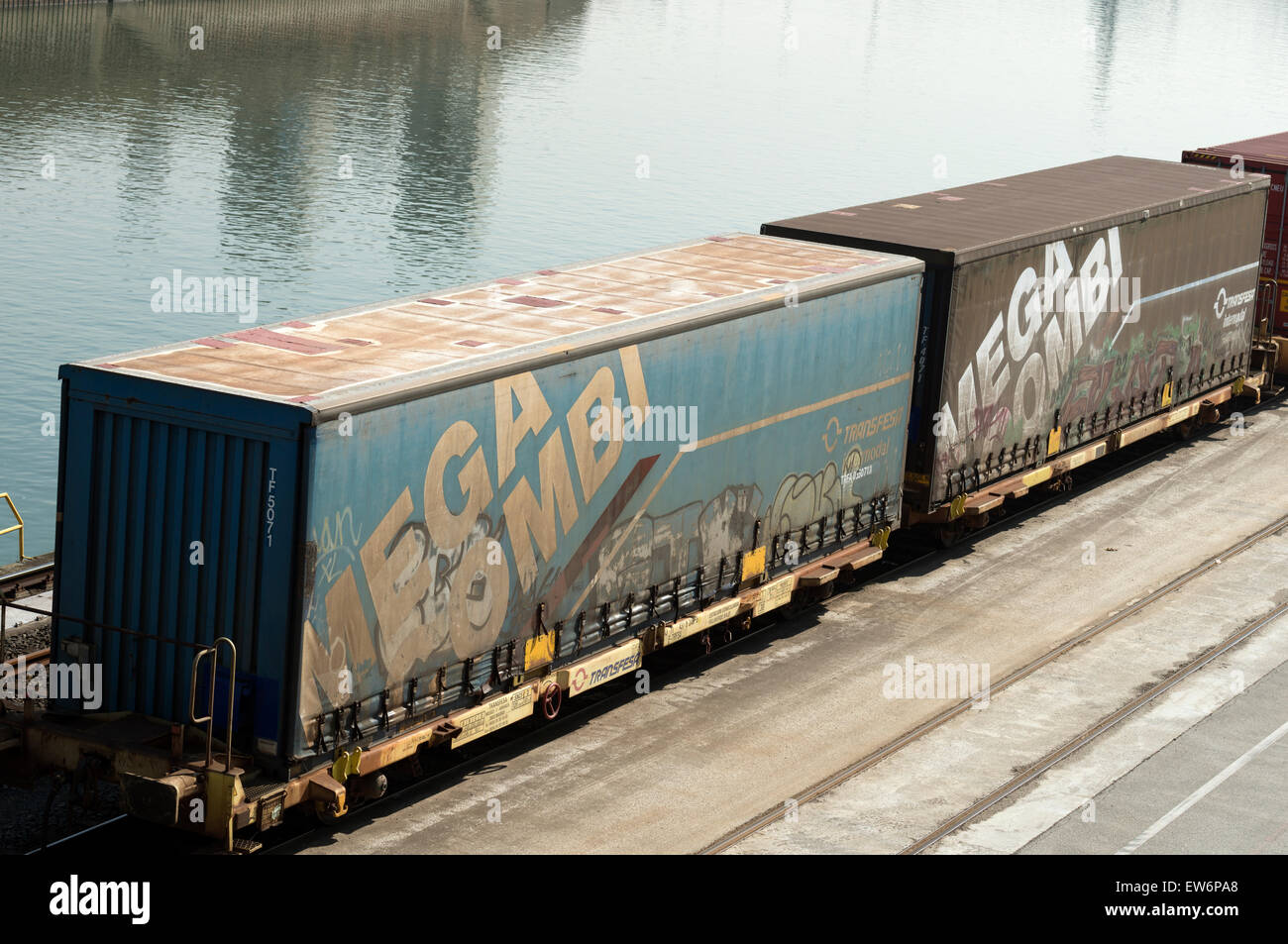 Mega Combi containers loaded to freight train Stock Photo - Alamy