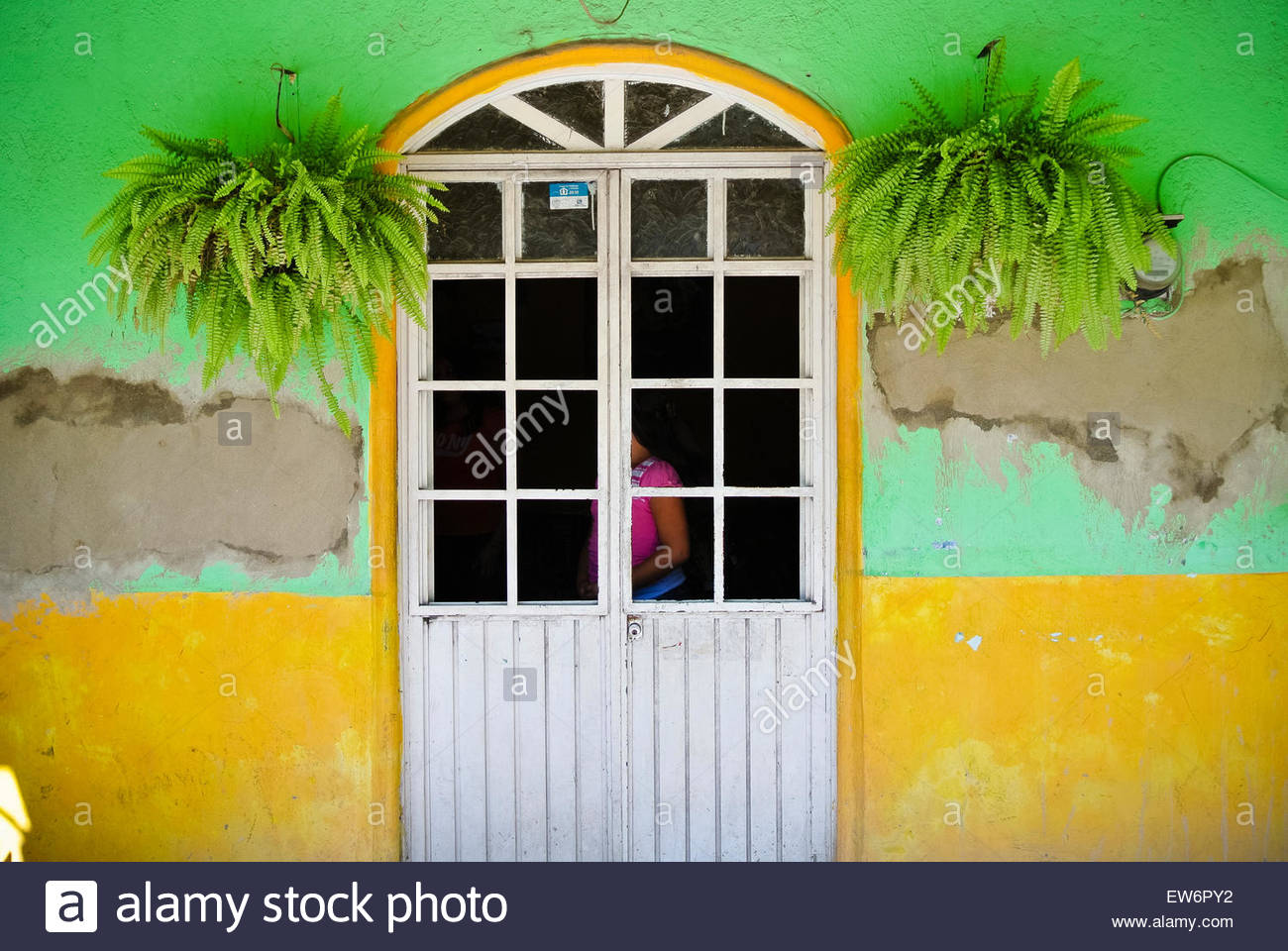 Woman Standing Behind Door Stock Photos & Woman Standing Behind Door ...