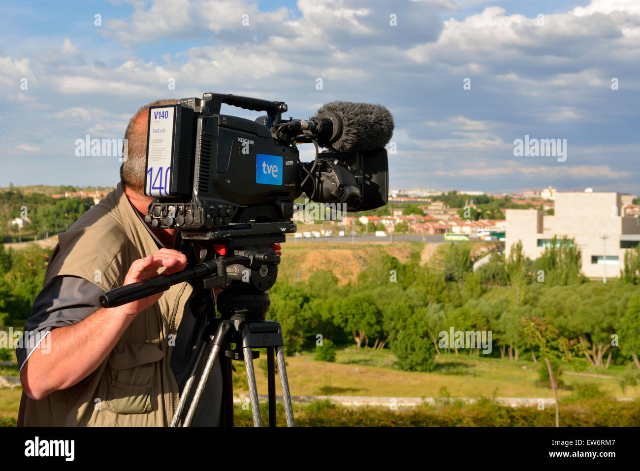 TV cameraman filming Stock Photo - Alamy