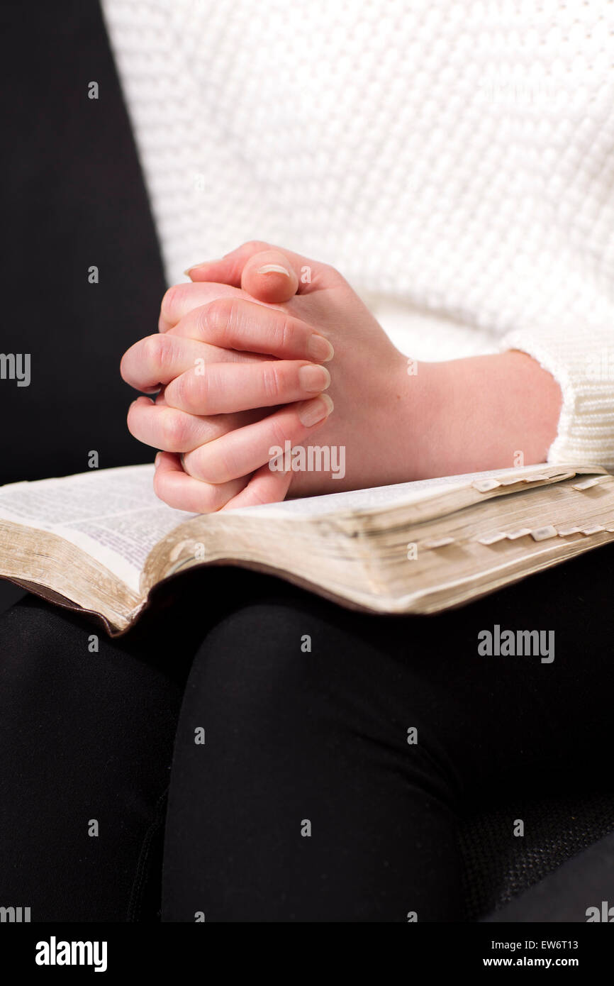 Reading the bible and pray Stock Photo - Alamy
