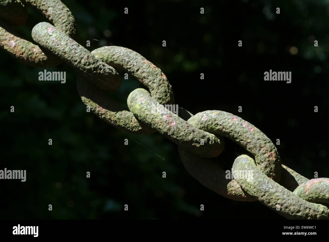 Rusty chain with black background Stock Photo - Alamy