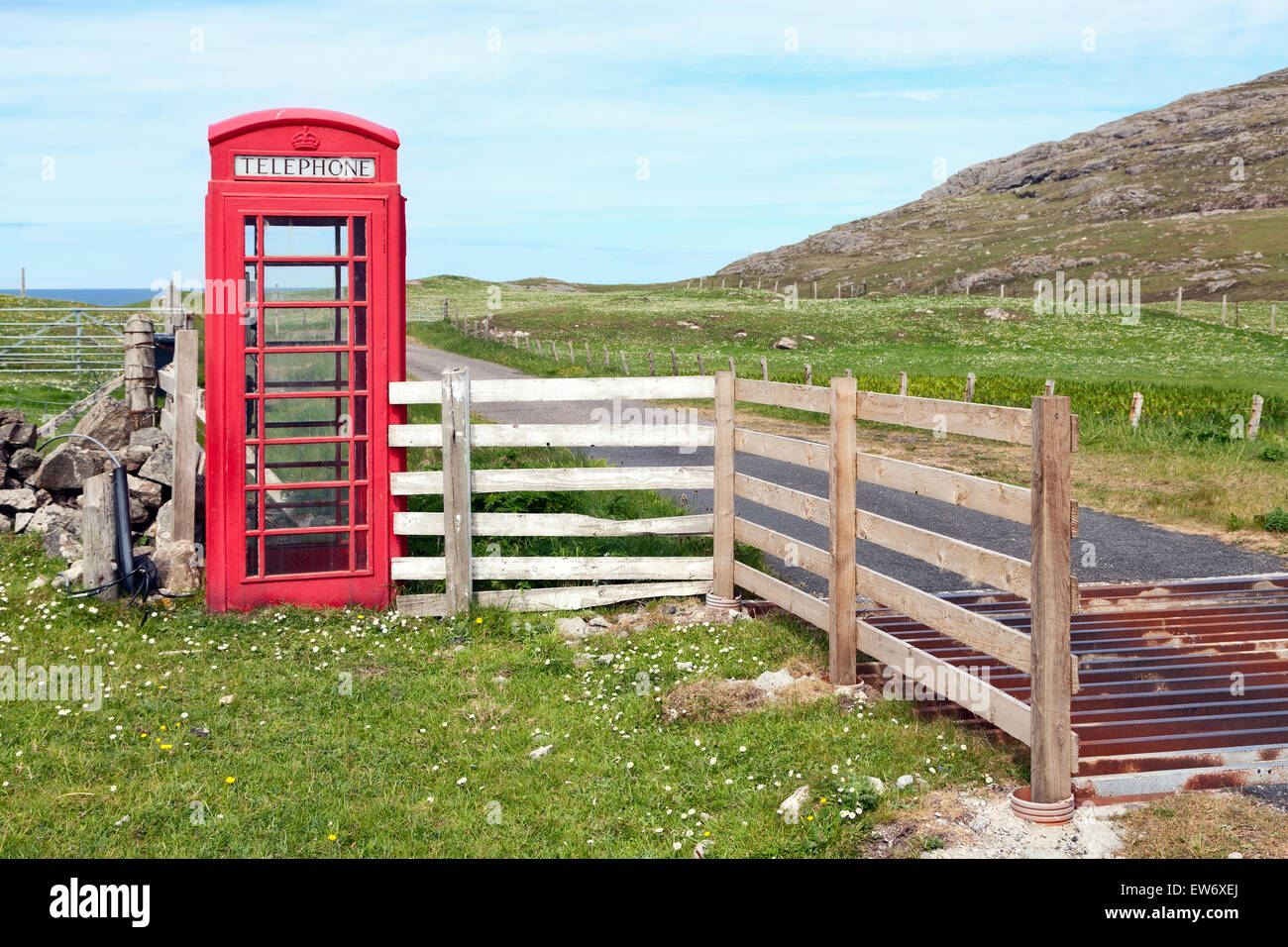 Traditional red phone booth in scottish countryside Stock Photo - Alamy