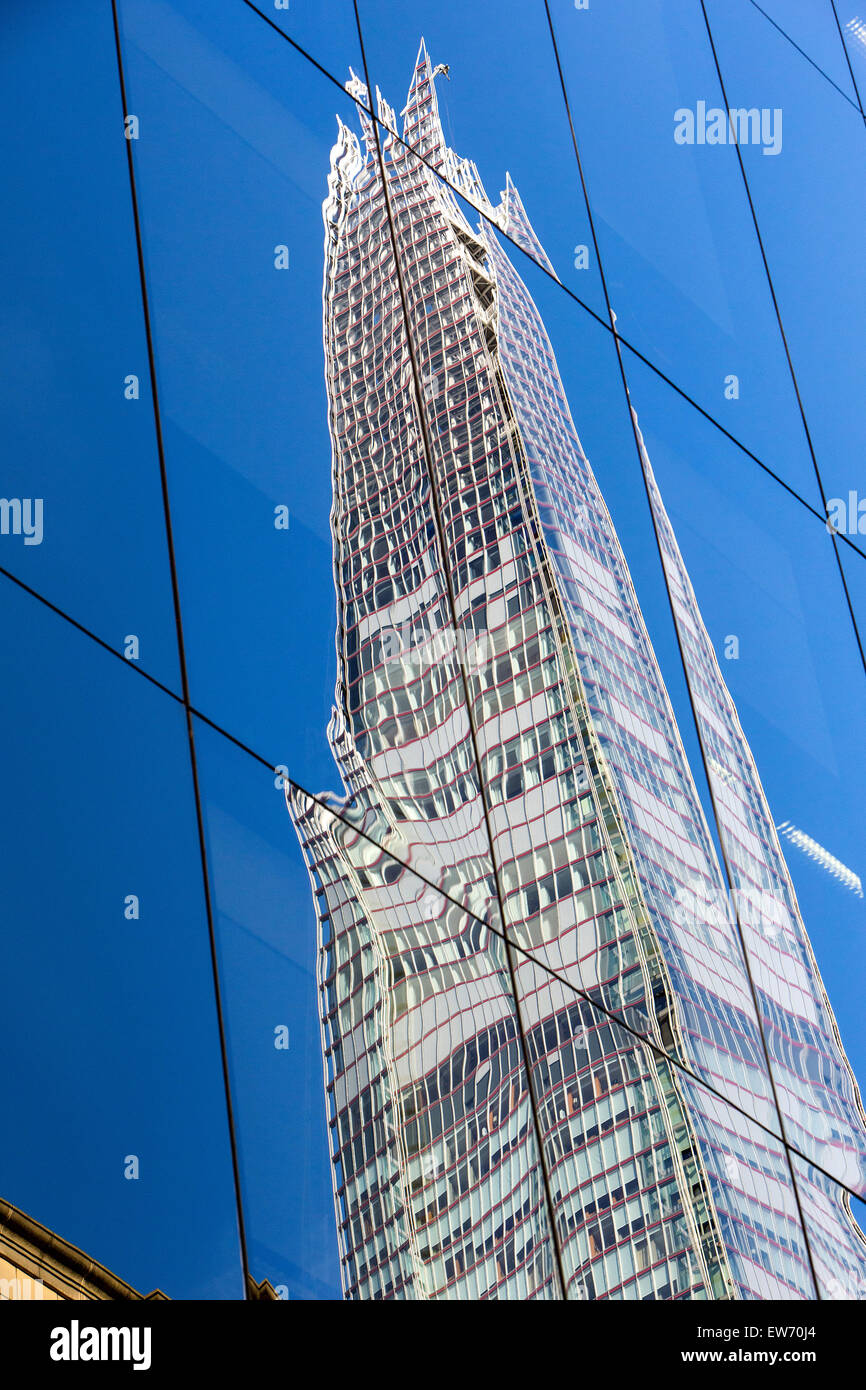 View of The Shard reflected in the glass of a high rise building Stock ...