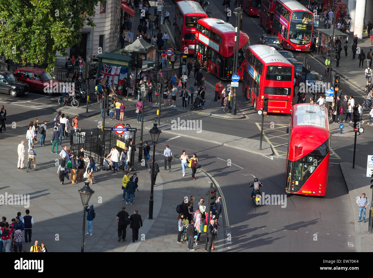 Red double decker buses on busy street in central London Stock Photo ...