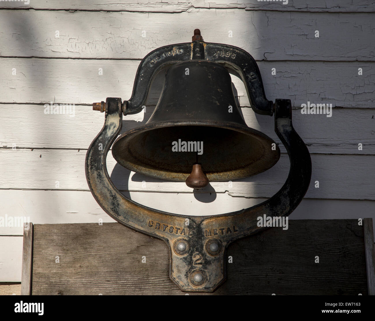 An old bell on the side of a building Stock Photo - Alamy