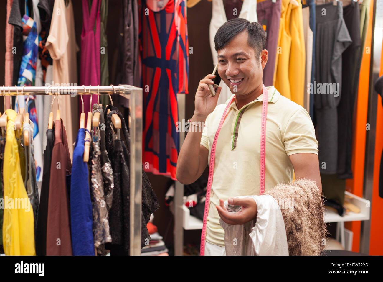 Asian man tailor phone call talking fashion clothes dress Stock Photo ...