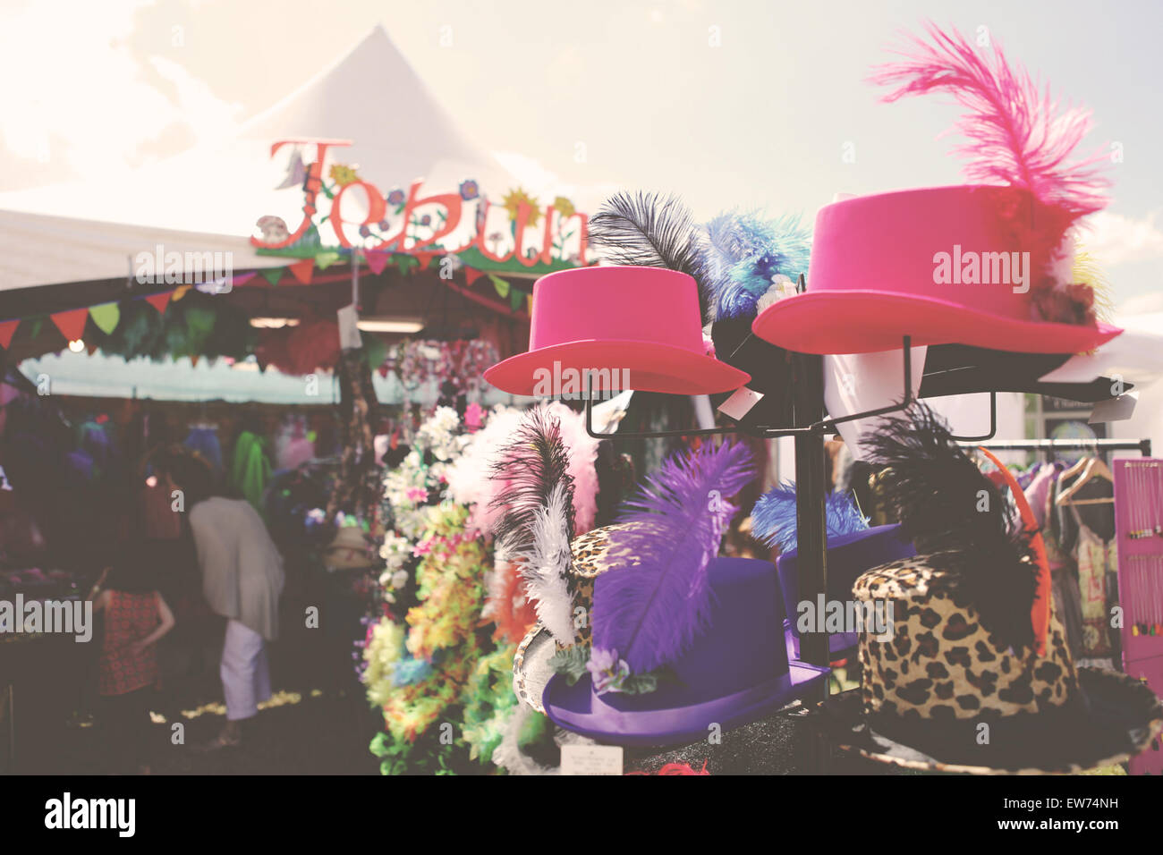 Music festival shop selling hats Stock Photo - Alamy