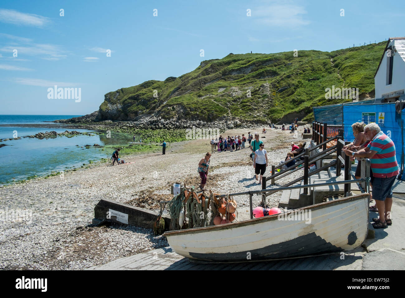 Lulworth Cove is a cove near the village of West Lulworth, on the ...