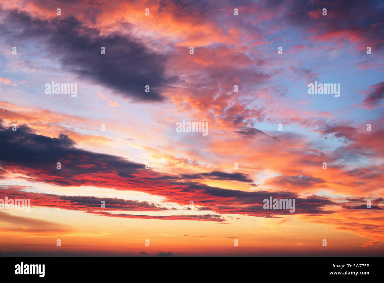sunset sky with multicolor clouds Stock Photo - Alamy