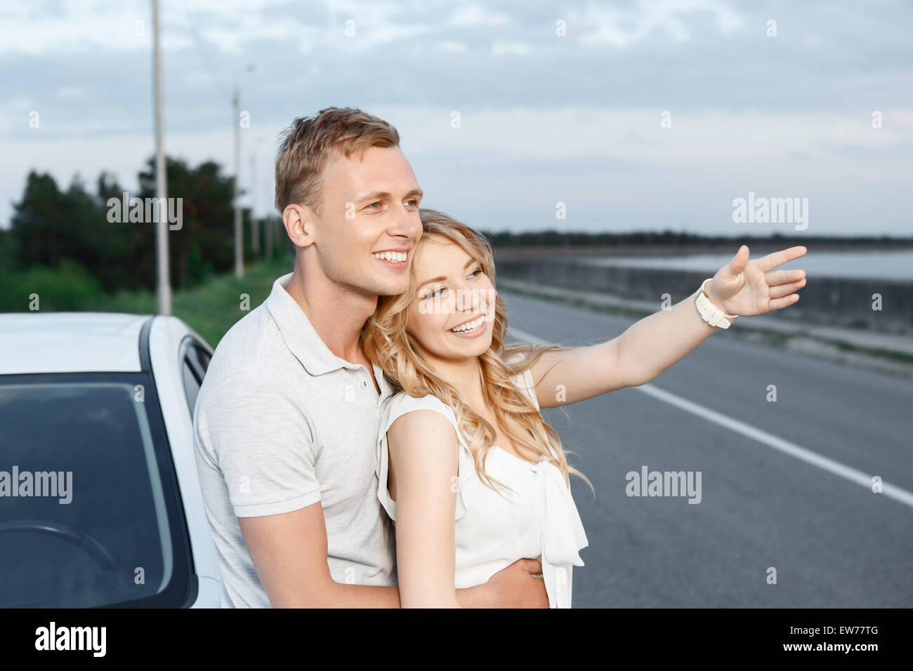 Lovely couple near the car Stock Photo - Alamy