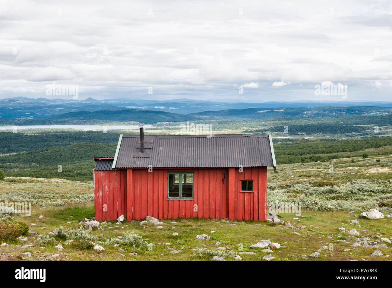 Norway. A mountain hut or hiking cabin in the rugged mountainous ...