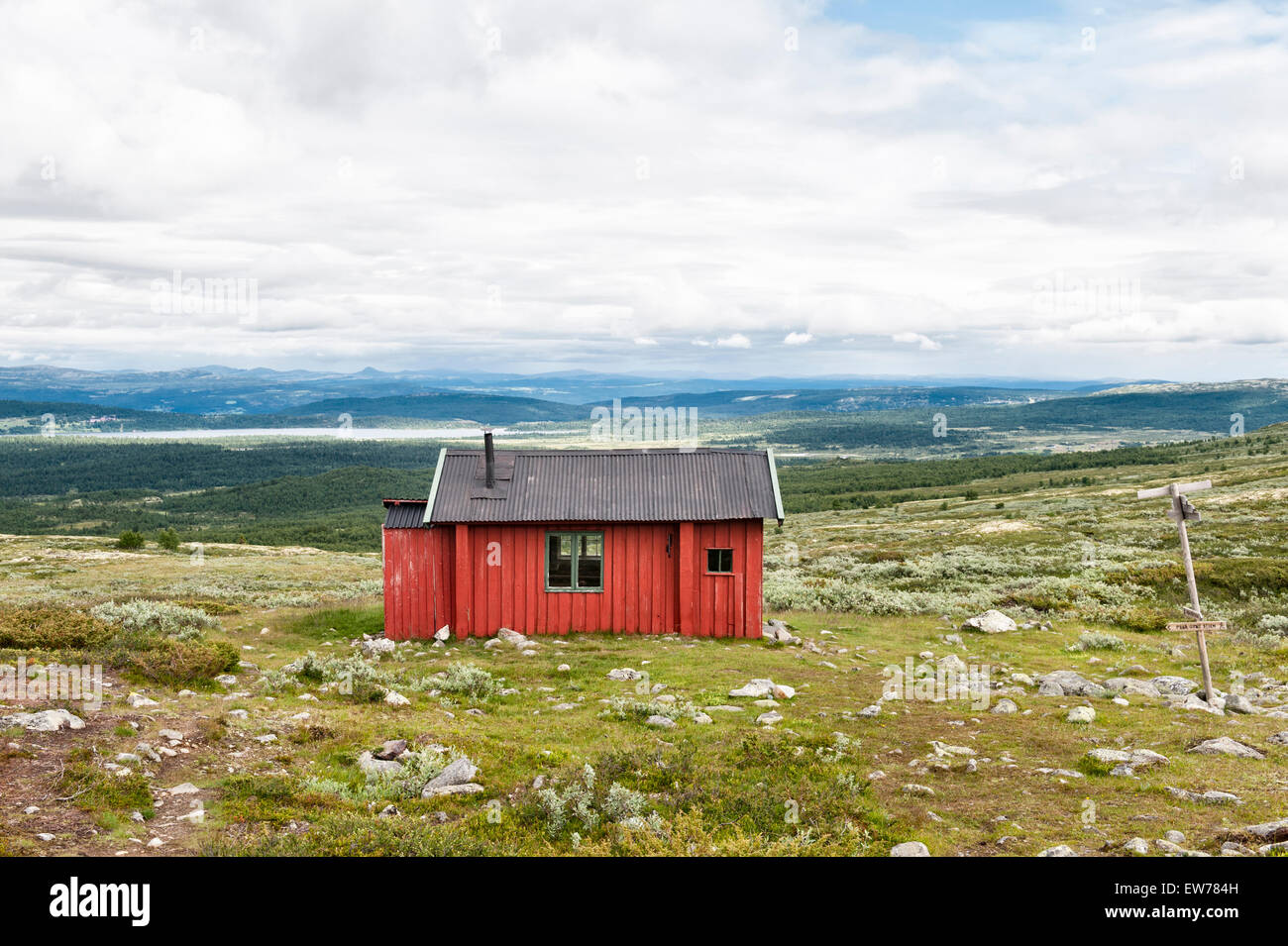 Norway. A mountain hut or hiking cabin in the rugged mountainous ...